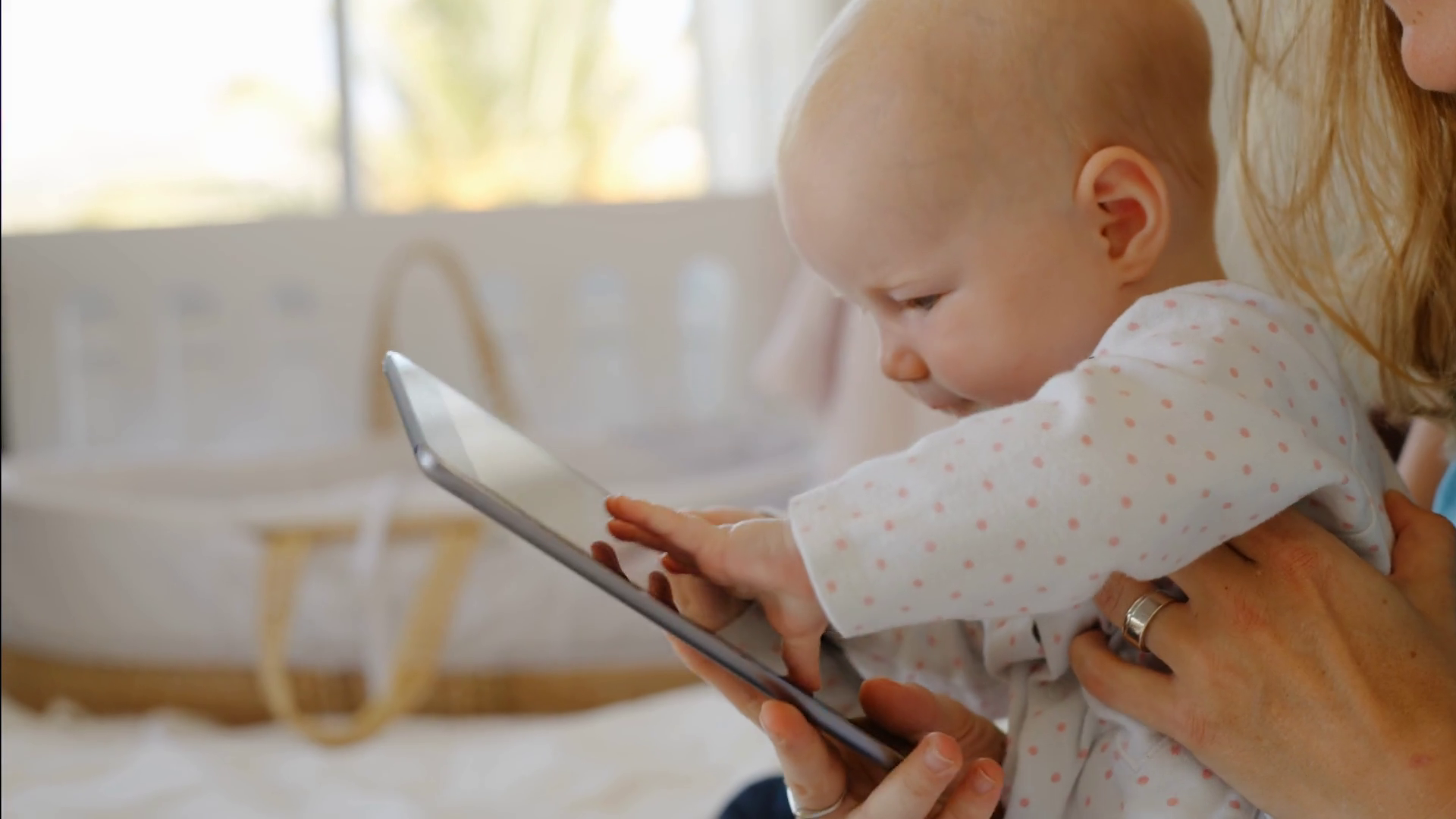 Baby daughter playing with ipad tablet Stock Video Footage - Storyblocks