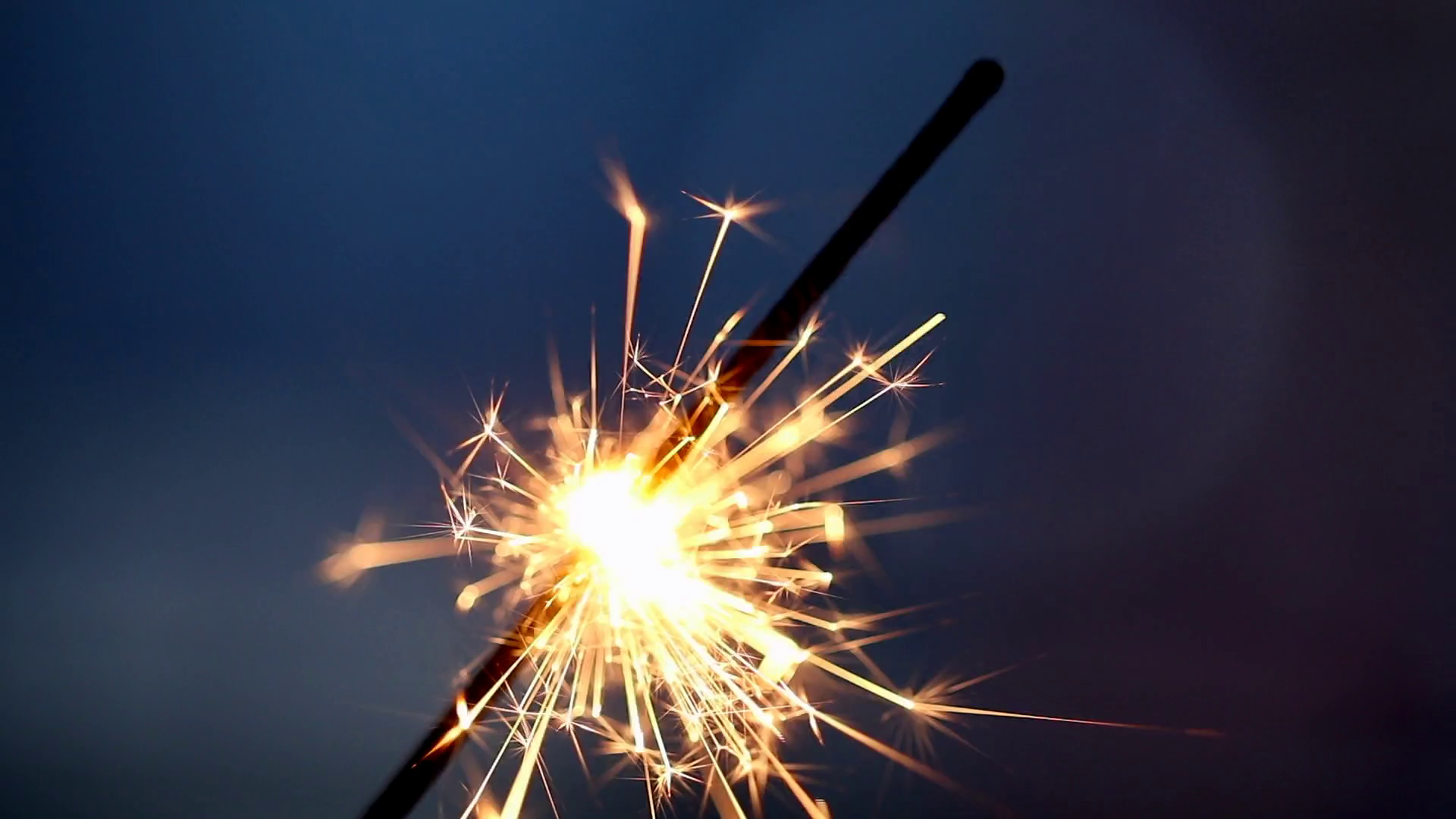 Burning Sparkler On Blue Background Stock Footage SBV-319627220 ...