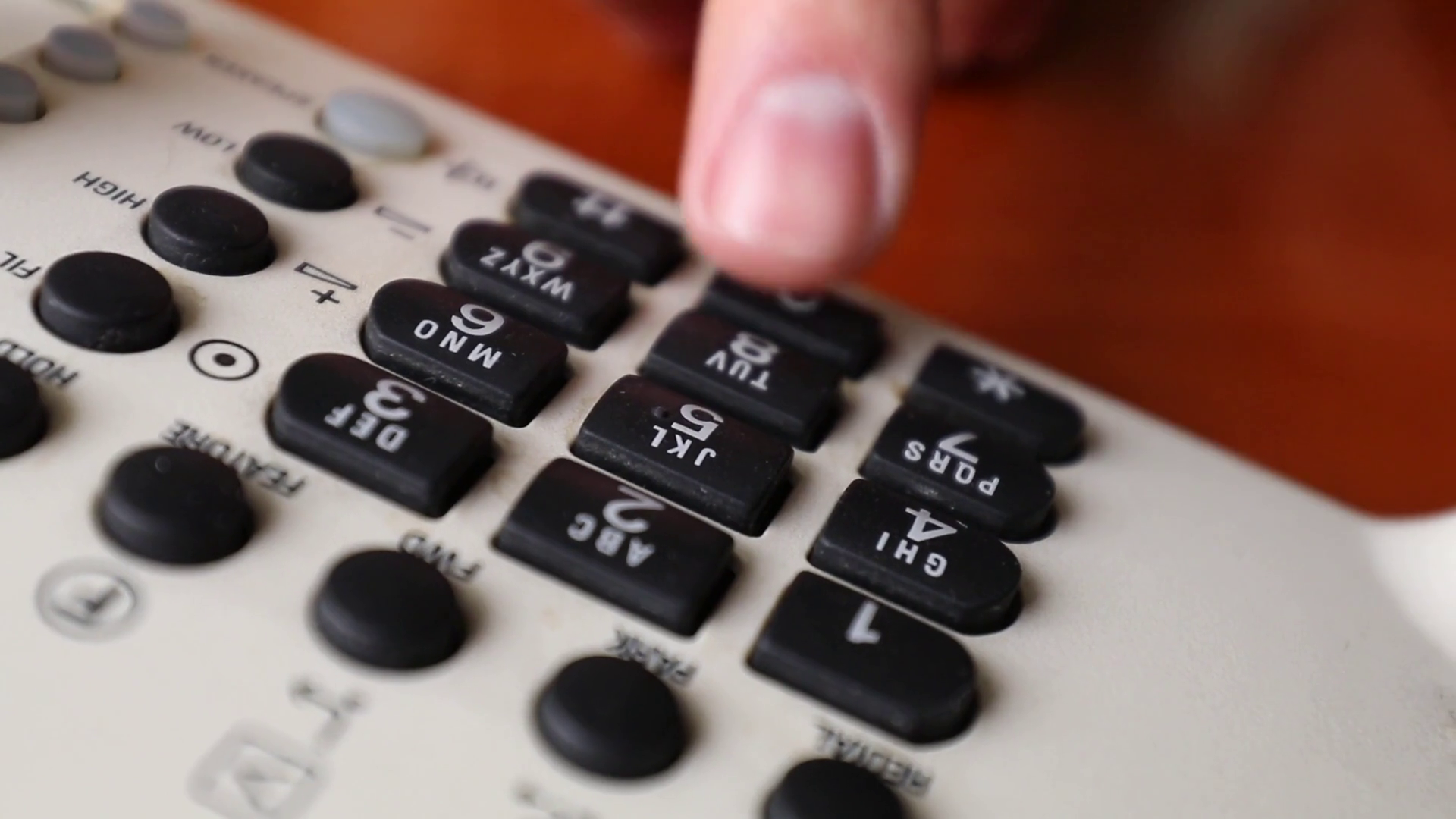 Closeup Of Office Phone Dials Person Calling Stock Footage SBV closeup-of-office-phone-dials-person-calling-stock-footage-sbv