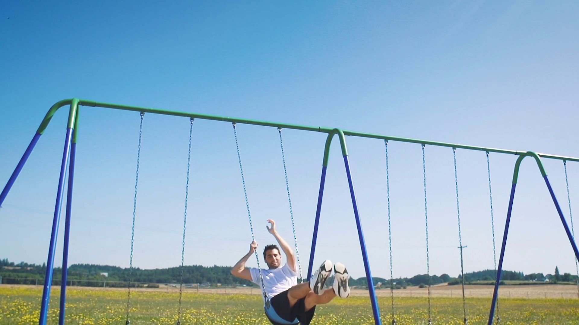 Slow Mo Shot Of Man Jumping Off Swing Stock Footage SBV-313570085 ...