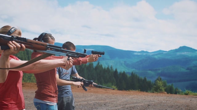 Women Shooting Gun Stock Footage: Royalty-Free Video Clips - Storyblocks