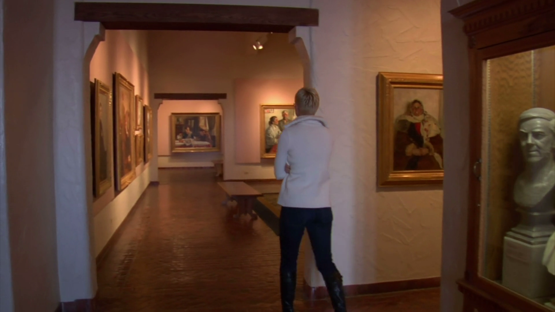 Woman Walks Through Art Gallery Stock Footage SBV-300147650 - Storyblocks