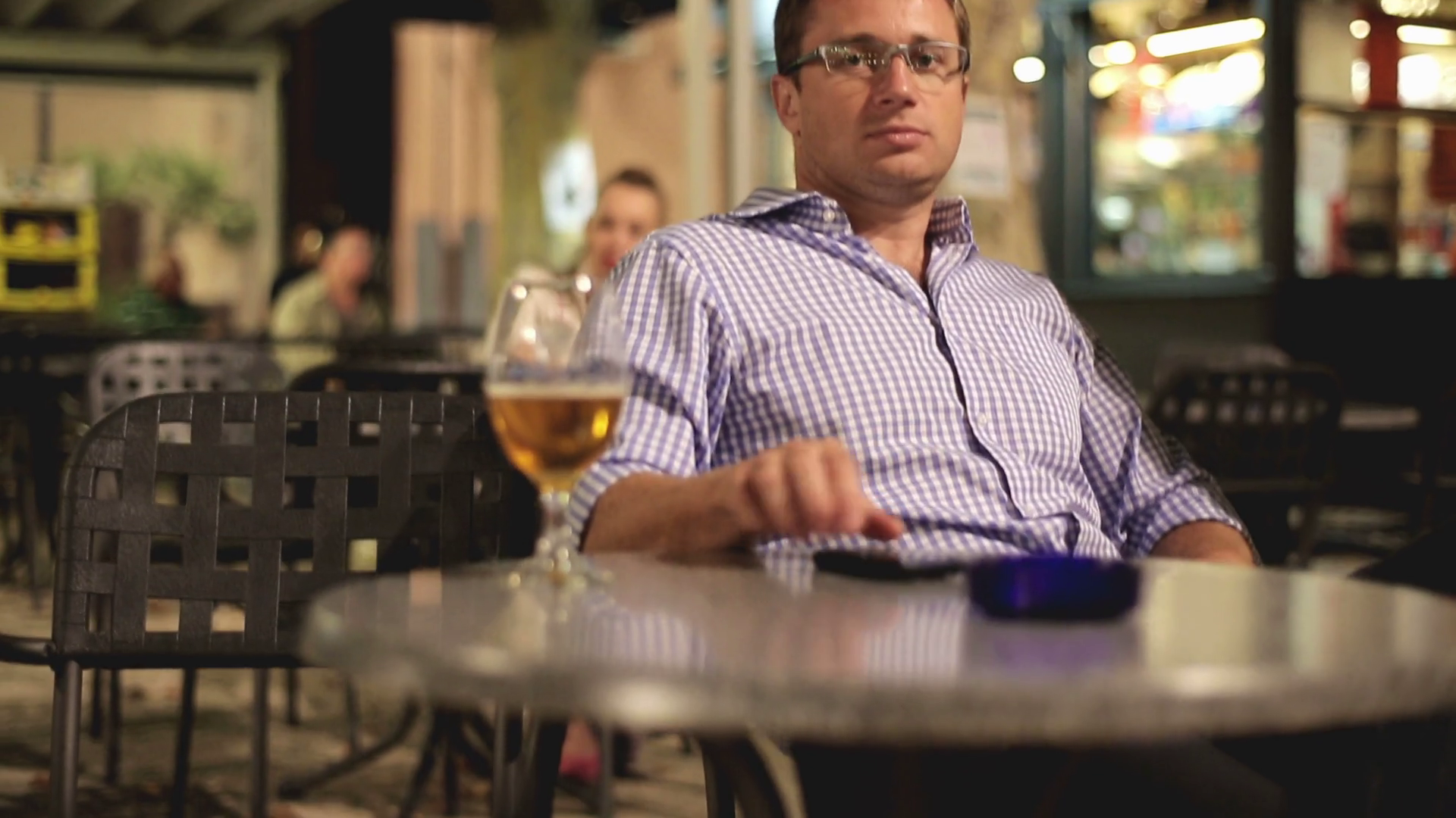 Young man waiting for somebody in the restaurant, evening Stock Video ...
