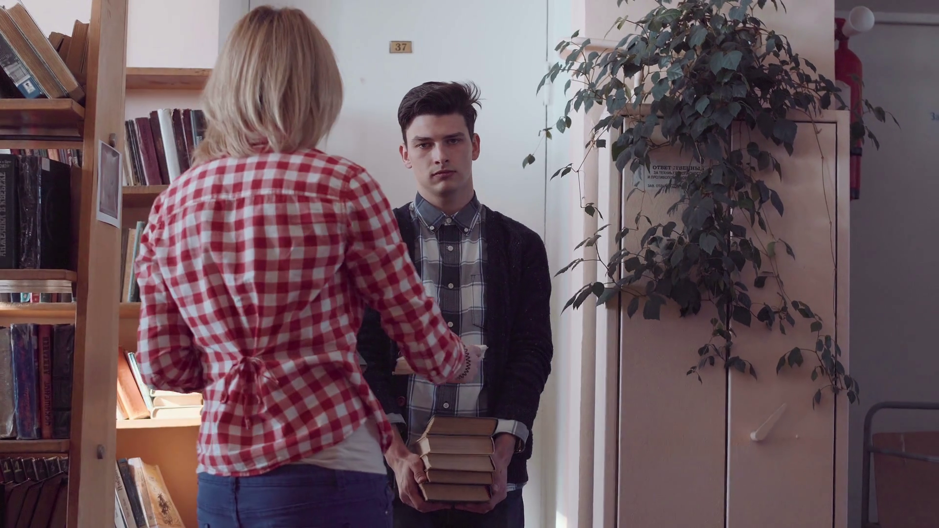 Young Students Organizing Books In Library Stock Footage SBV-312682810 ...