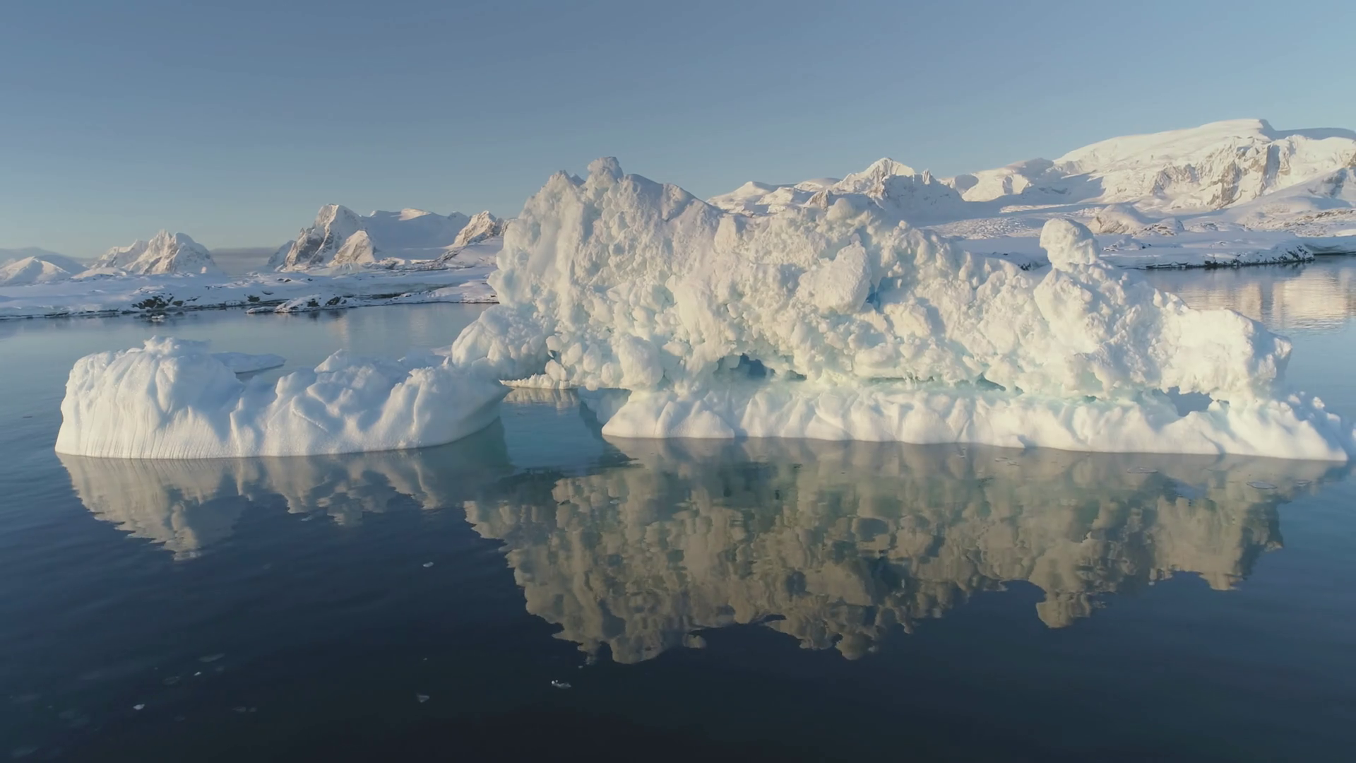 Iceberg Melt In Clear Ocean Water Drone Stock Footage SBV-348391898 ...