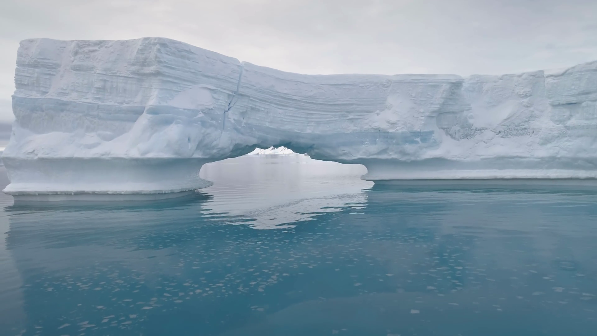 Passing Through Arctic Iceberg Arch Stock Footage SBV-348389912 ...