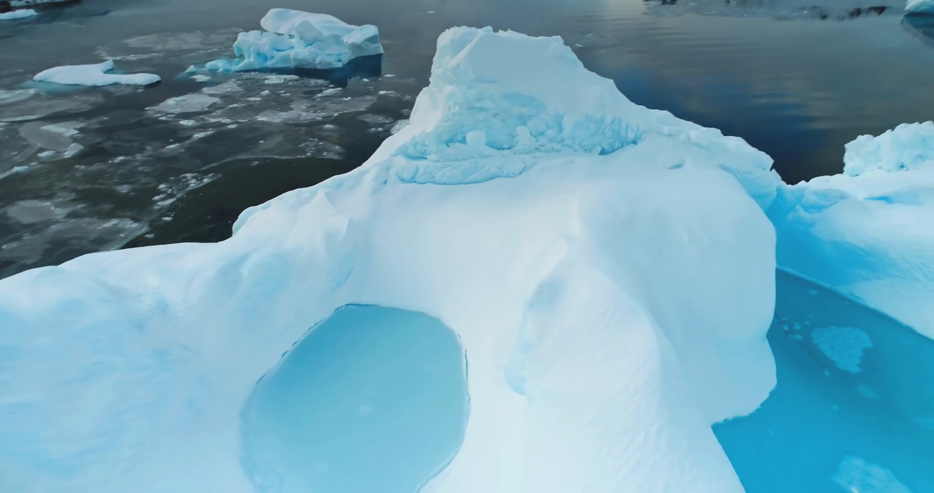 Large Iceberg With Melting Blue Water Inside Stock Footage SBV ...