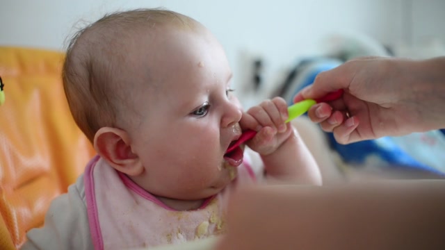 Baby Eat Food Stock Footage: Royalty-Free Video Clips - Storyblocks