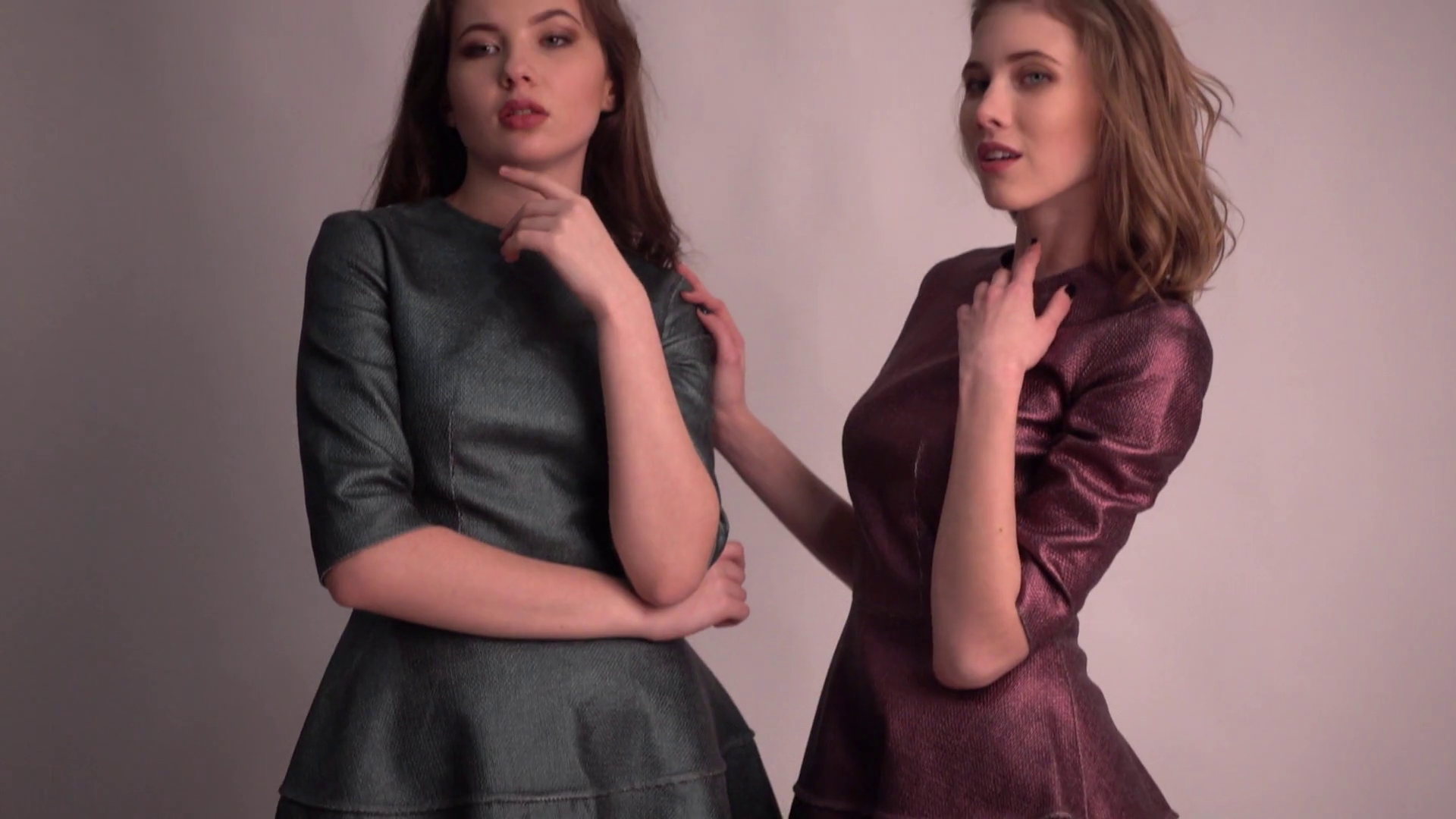 Two girls Models posing for Fashion Photo Session Studio Stock Video ...