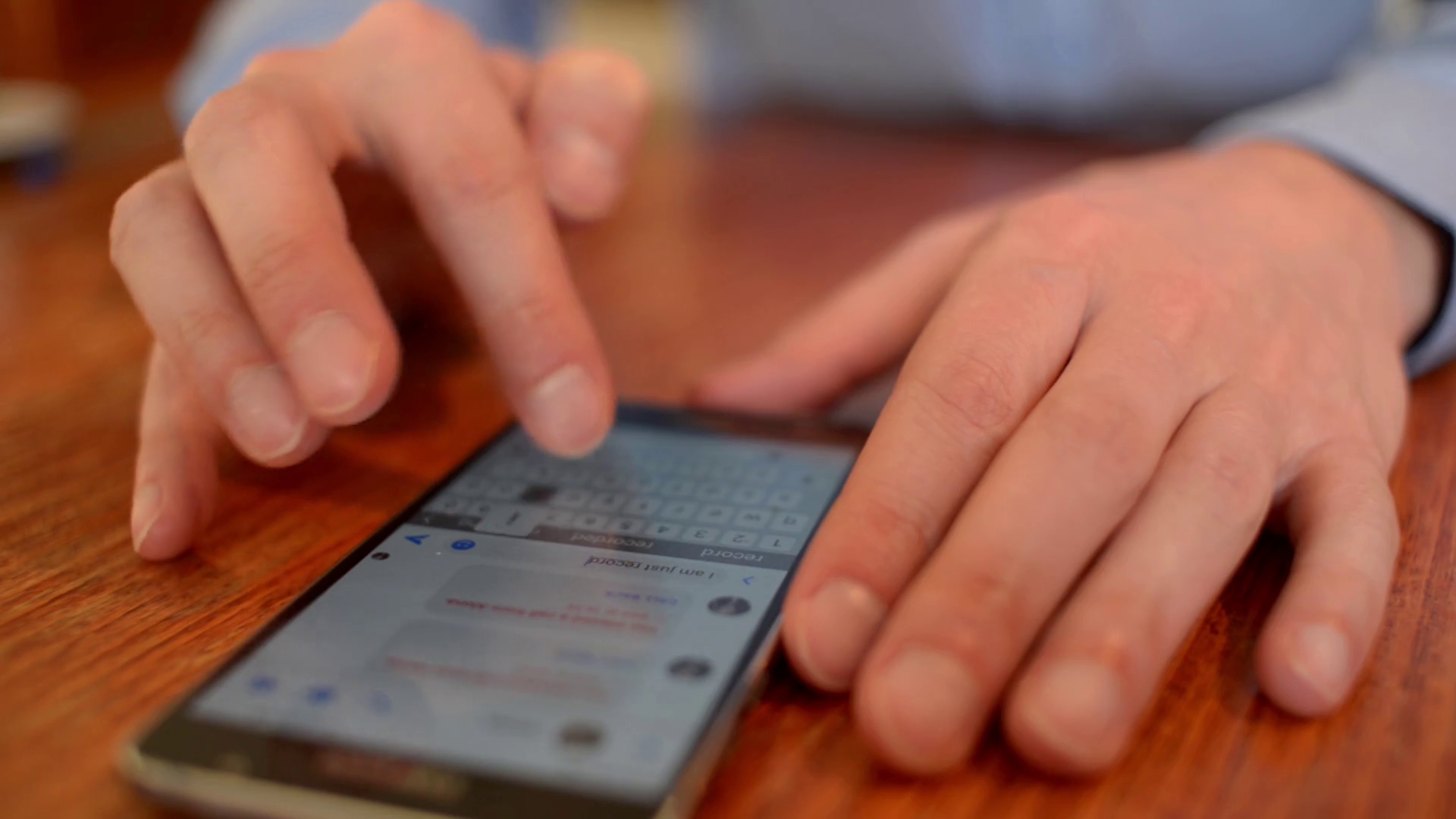 A Male writes a Message with Mobile Smart Phone, choose Smiley on ...