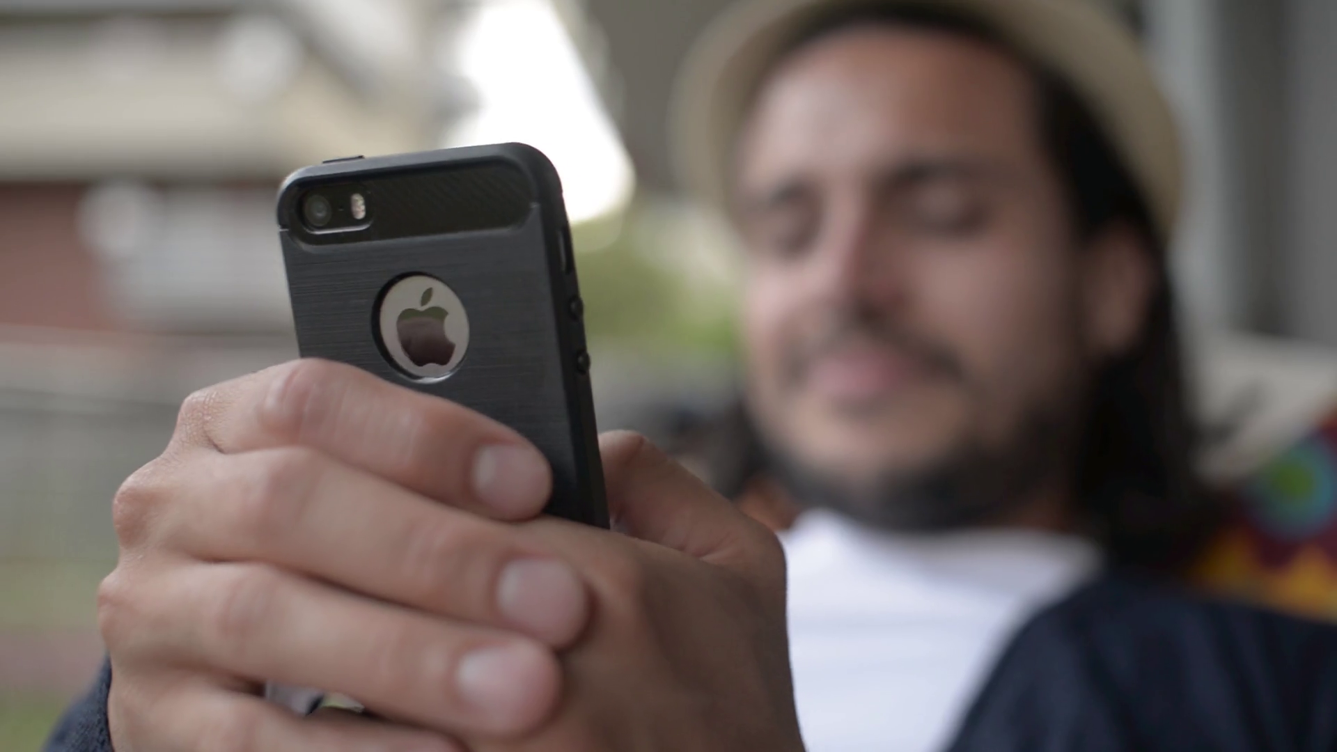 Young Latin Individual Uses Mobile Device To Stock Footage SBV ...