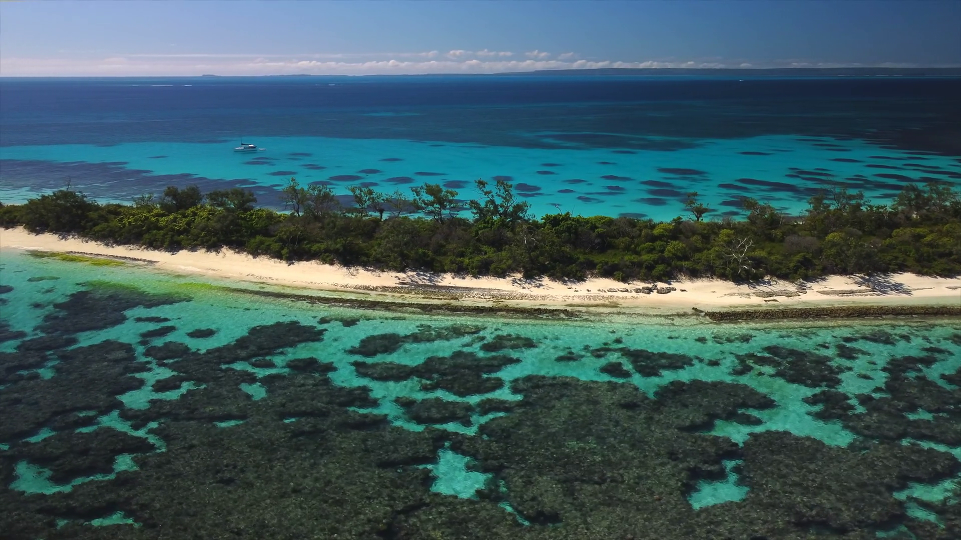 Crescent Shaped Island Among Pristine Coral Stock Footage SBV-348661234 ...