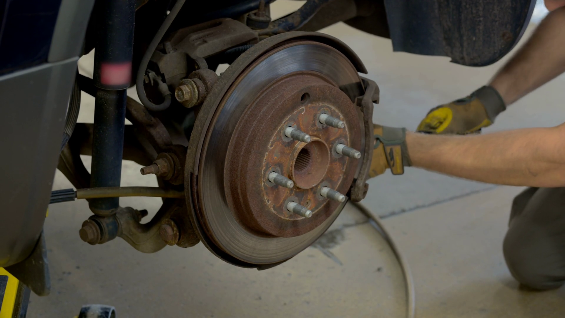 Mechanic Removing Old Brakes Rotors To Stock Footage SBV-352465238 ...