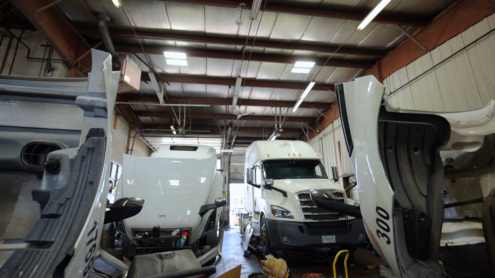 The Rows Of Trucks With Open Hoods Under Stock Footage SBV-352713114 ...