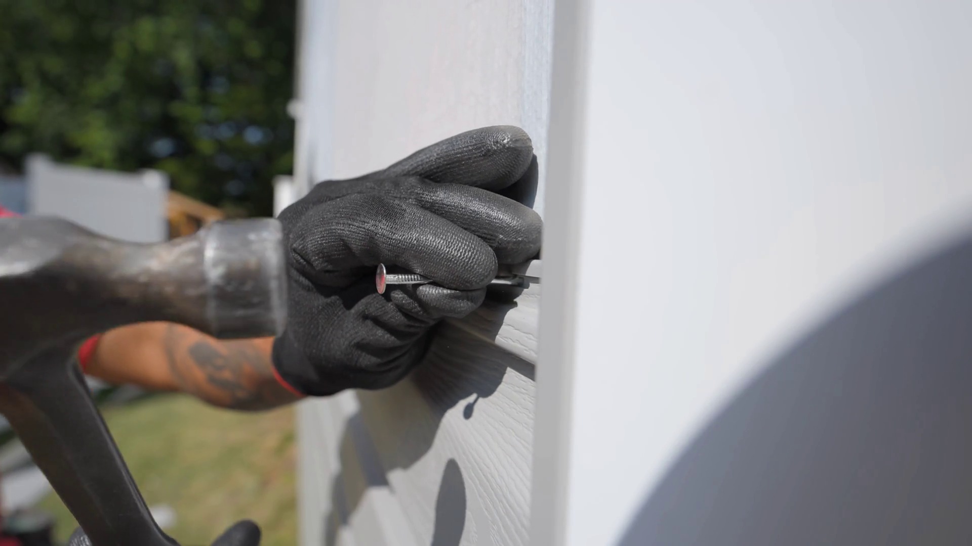 Worker Hummers Nail Into Plastic Panel Stock Footage SBV-352920186 ...