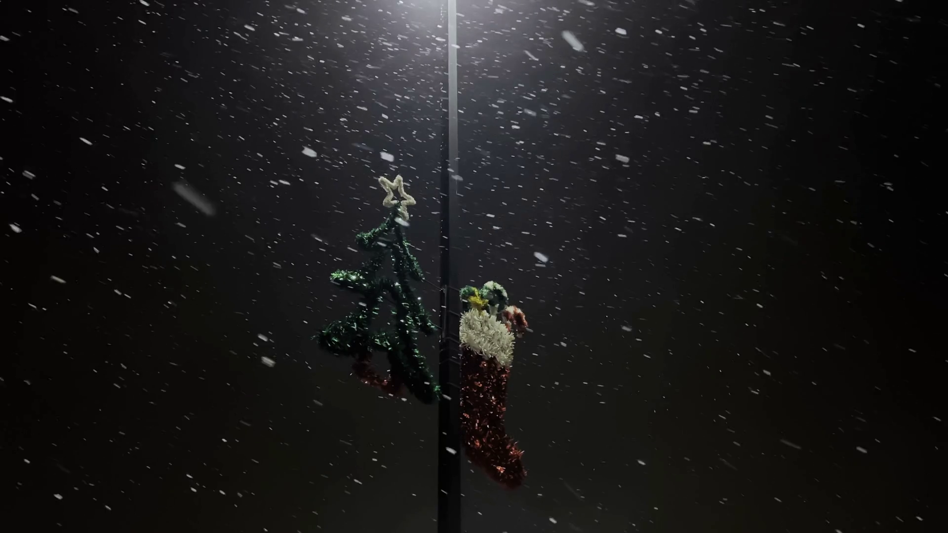 First snow falling for new year decoration illuminated with holiday ...