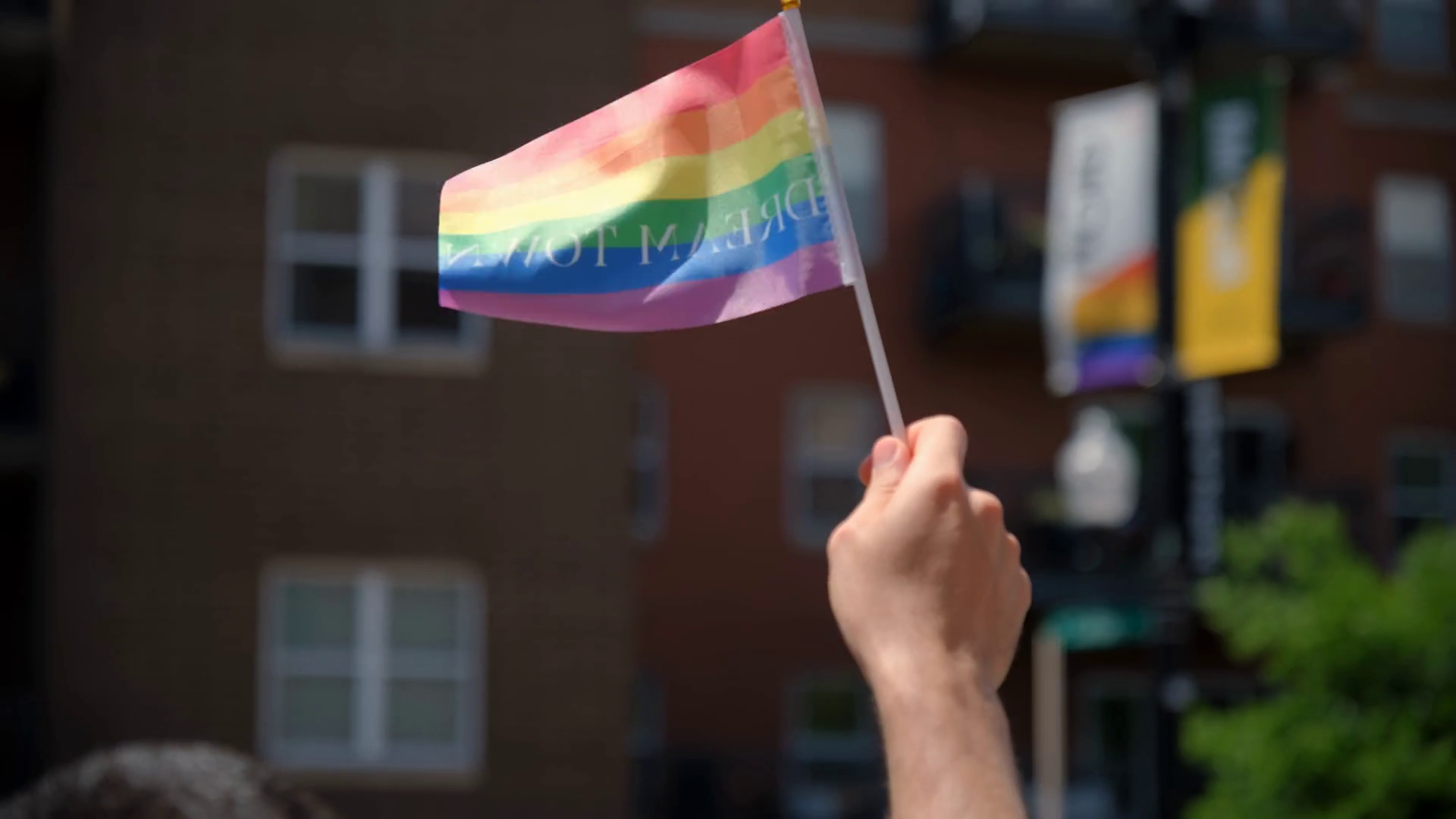 Hand Holding Flag Symbol Of Lgtbq At Pride Stock Footage SBV-348372933 ...