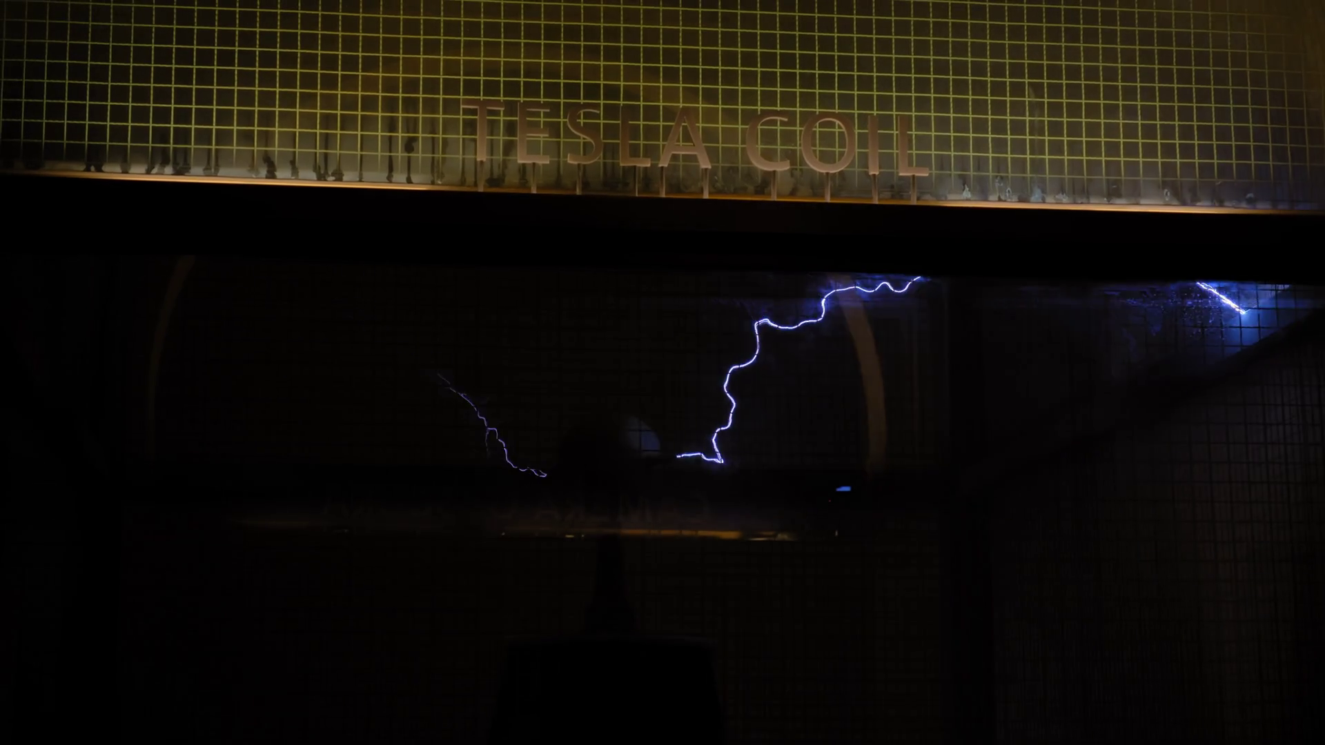 Tesla Coil Behind Cage Exhibit At Griffith Stock Footage SBV-348770611 ...