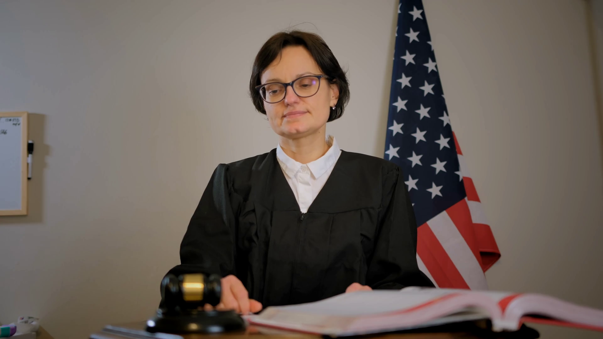 Female Judge Using Wooden Gavel In Courtroom Stock Footage SBV ...