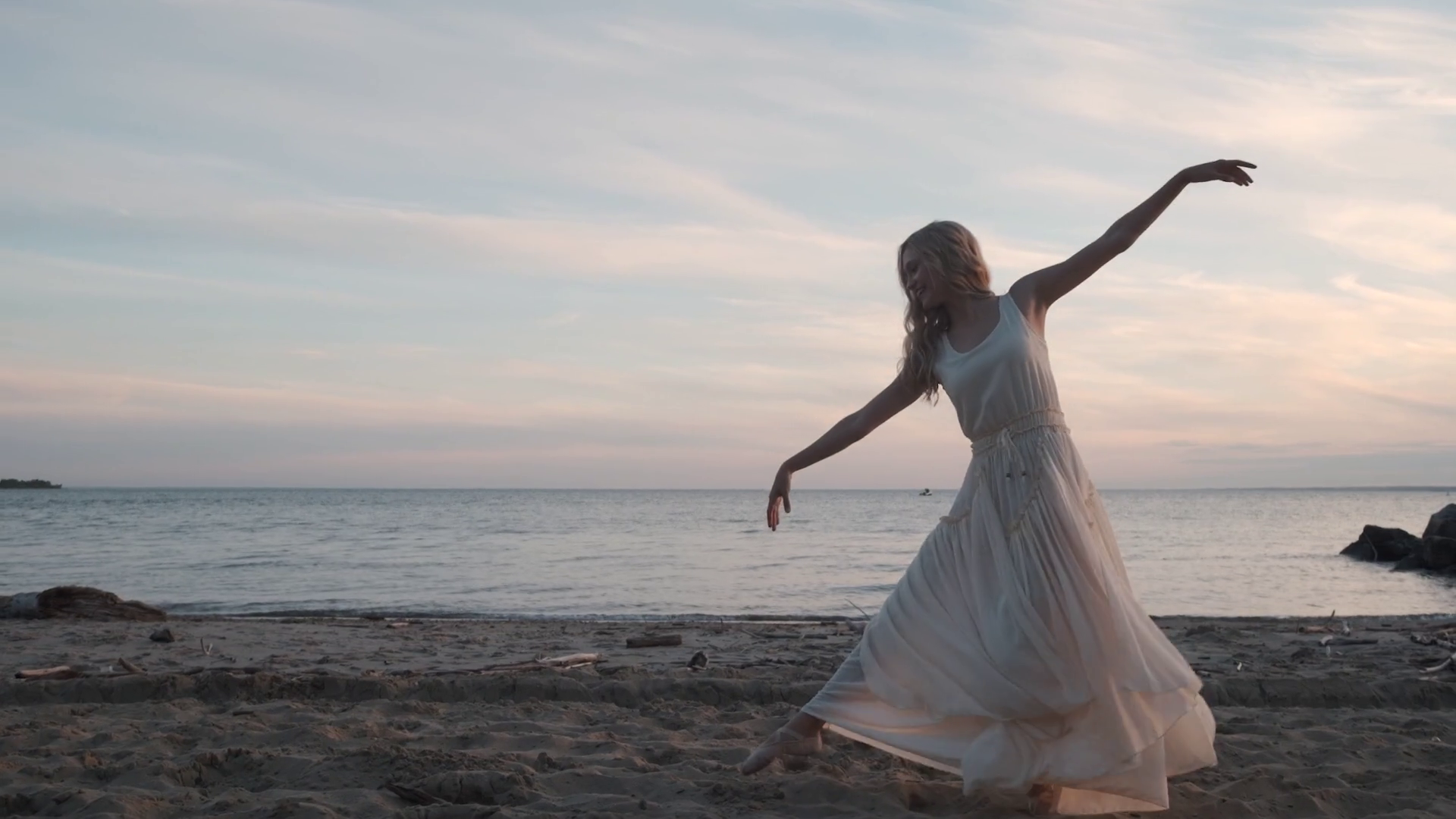 Ballerina In Flowing Dress Dancing By Sea At Stock Footage SBV ...