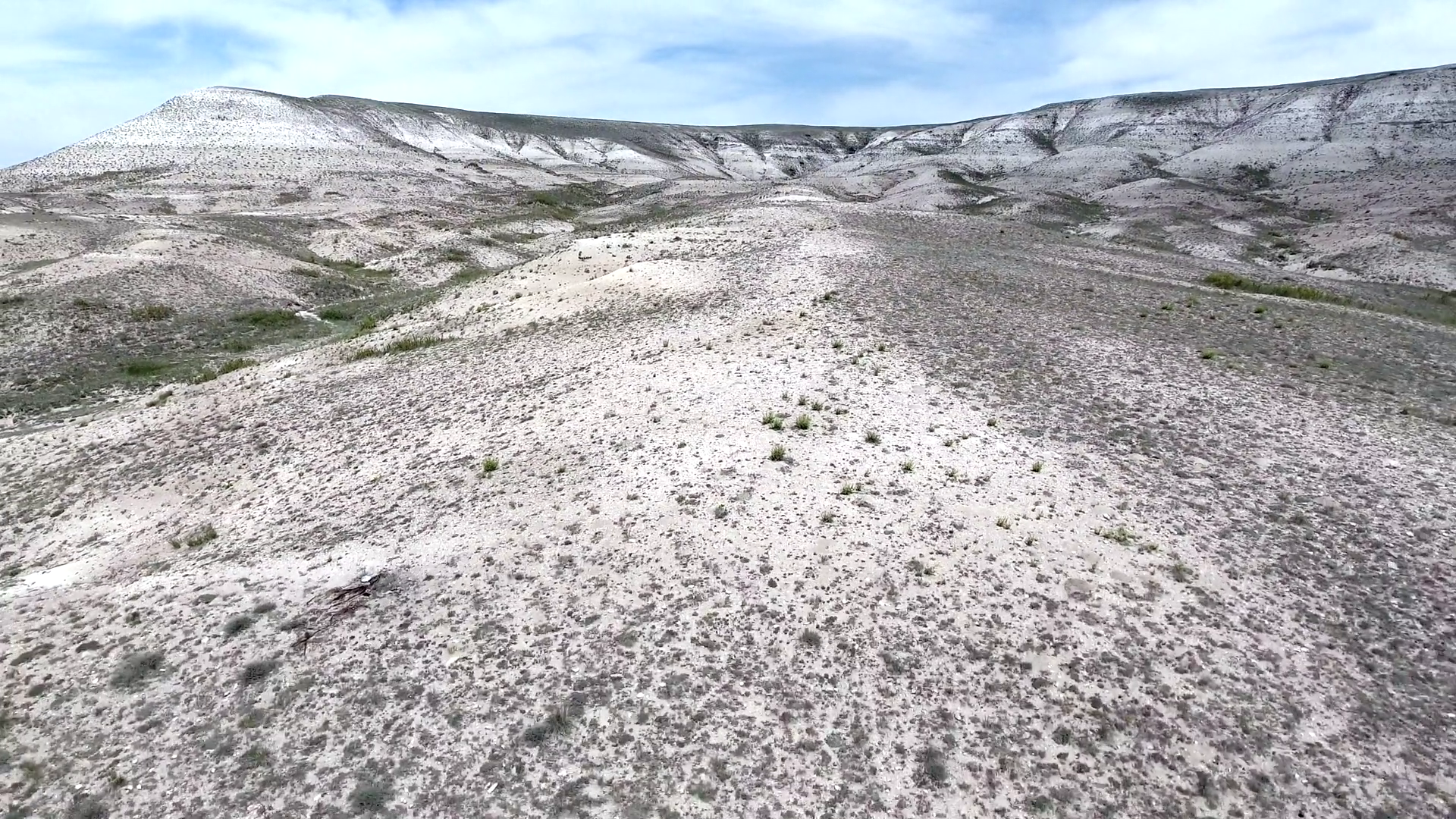 Aerial View Of Eroded Mesa Hills Exposing Stock Footage SBV-352926591 ...