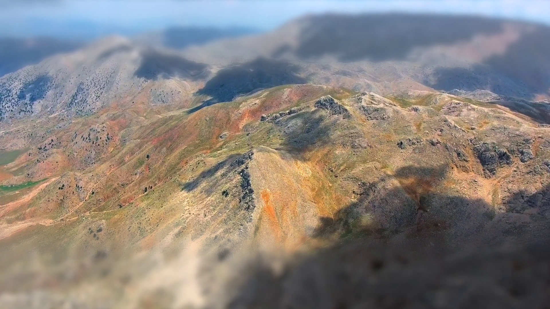 Aerial view of treeless arid and barren high altitude mountain ...
