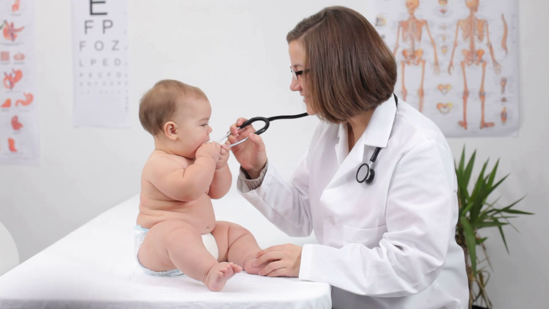 Femal Doctor Gives Baby Checkup Stock Footage SBV-348371271 - Storyblocks