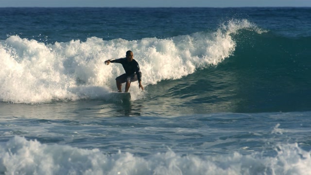 Surfing Beach Stock Footage: Royalty-Free Video Clips - Storyblocks