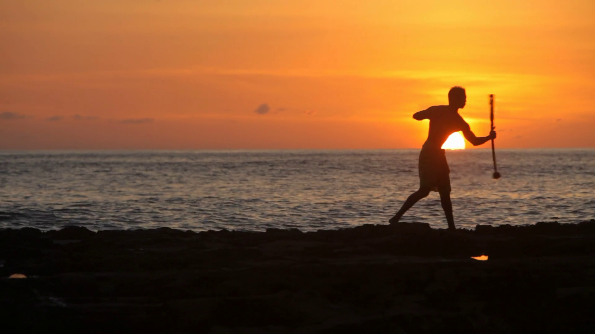 Hawaiian Fire Knife Dancer Performs At Sunset Stock Footage SBV ...