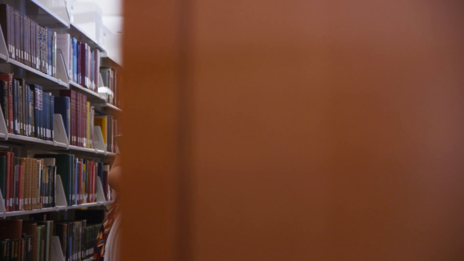 College Student In Library Holding Books Stock Footage SBV-347579273 ...