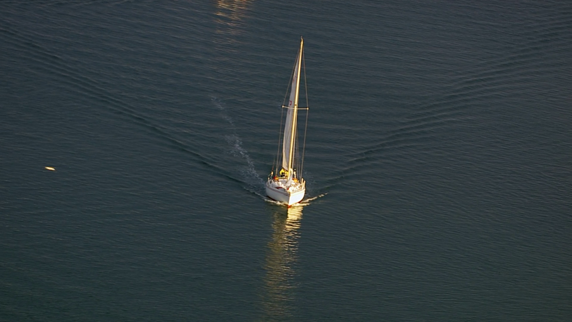 Zoom Out From Sailboat In Bay Stock Footage SBV-347580788 - Storyblocks