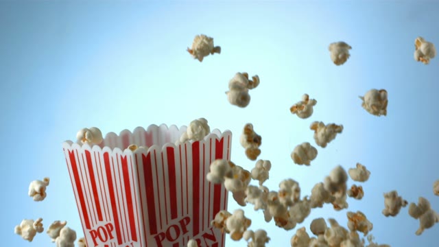 Popcorn Popping Slow Motion Stock Footage: Royalty-Free Video Clips ...