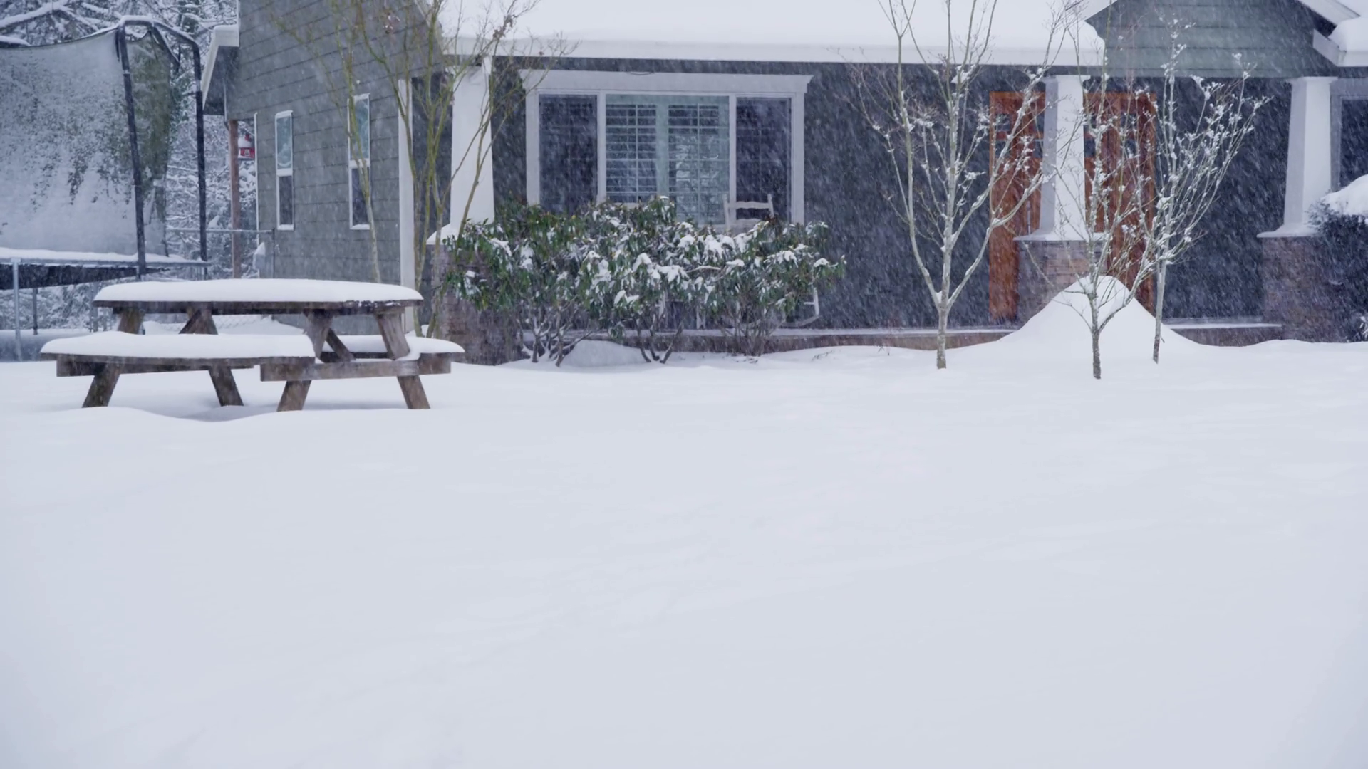 Home Exterior In Snow Storm Stock Footage SBV-347588574 - Storyblocks
