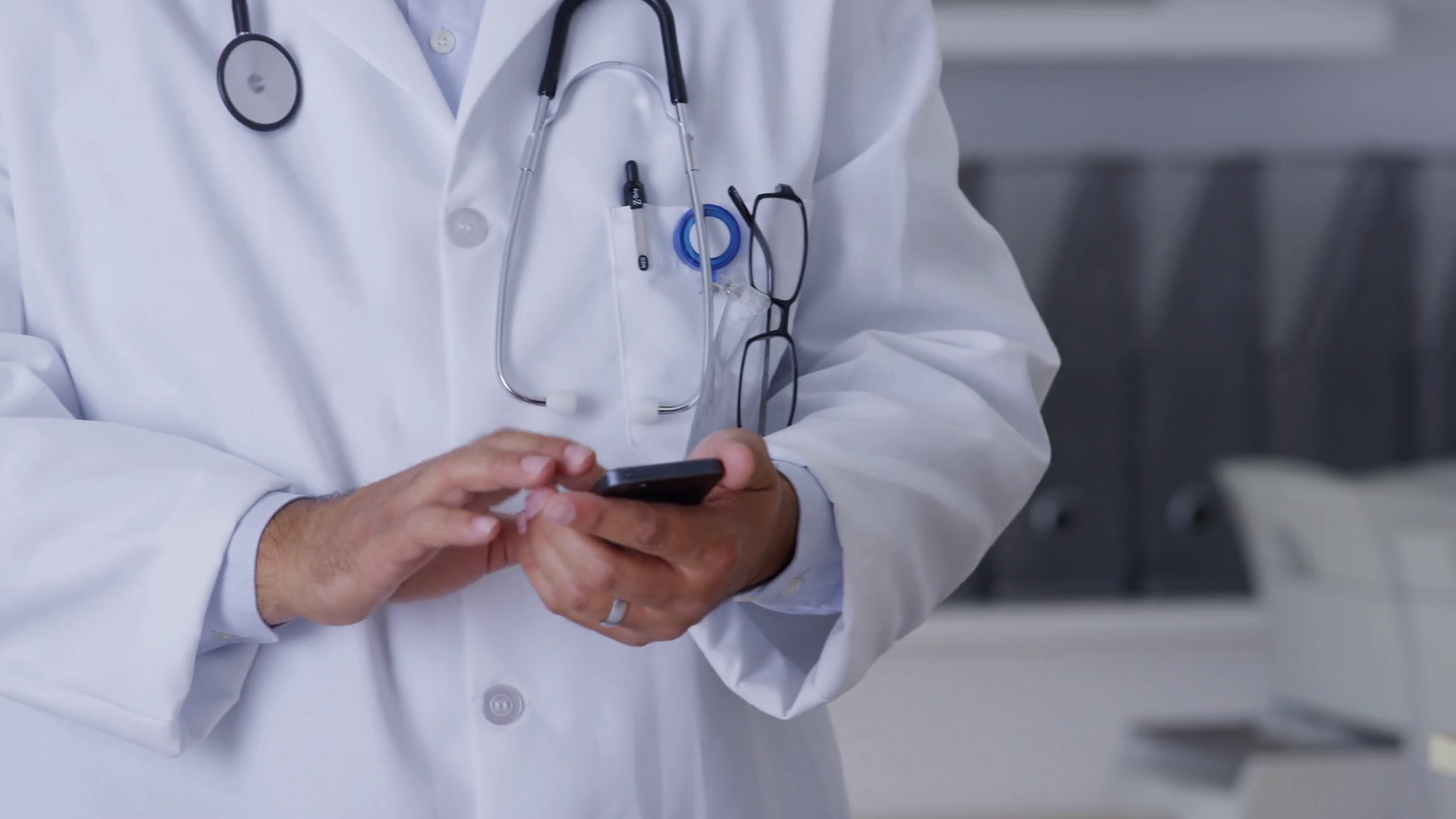 Closeup Of Doctor Using Cell Phone Stock Footage SBV-347590637 ...