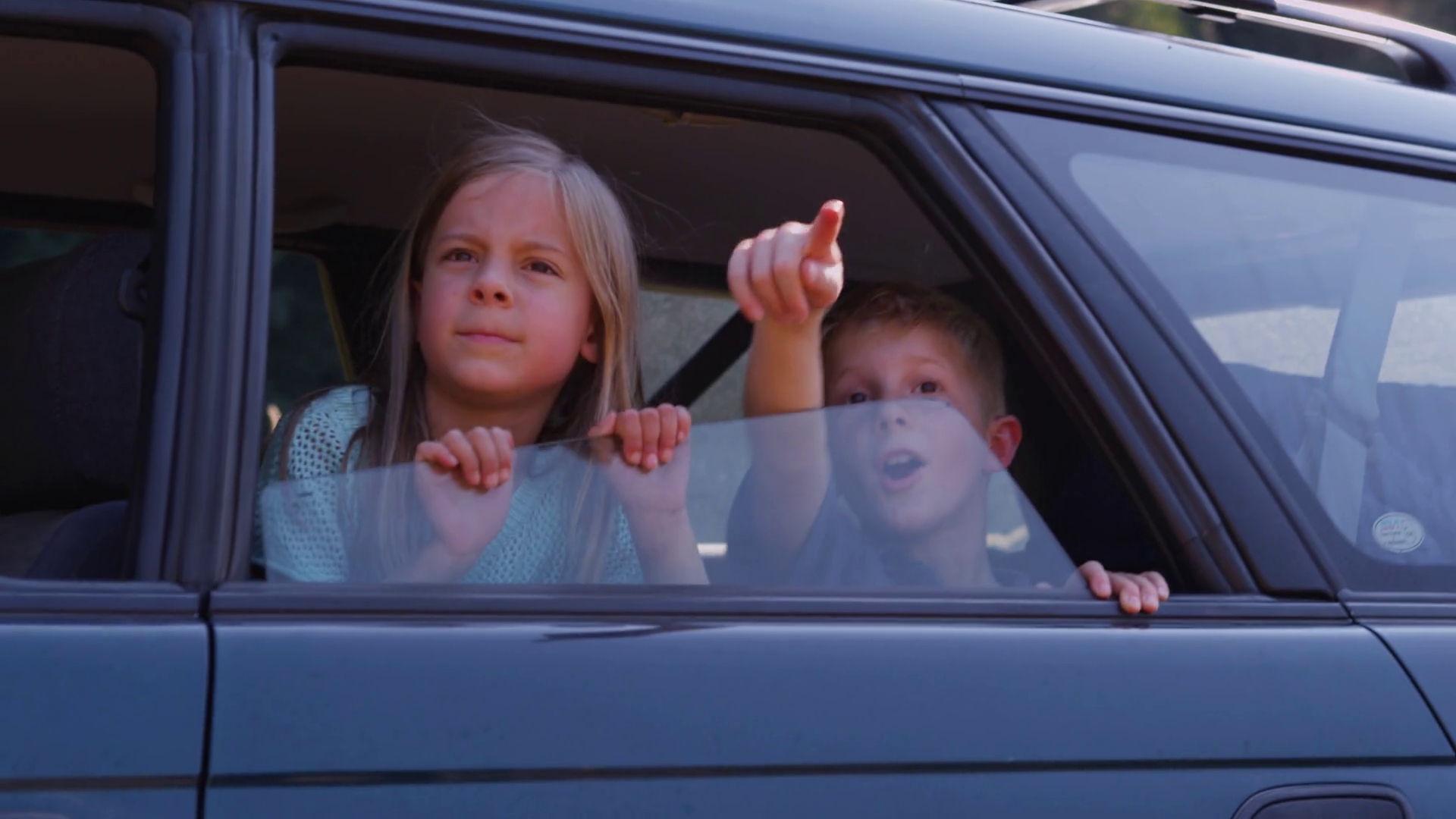 Two Children Looking Out Car Window Stock Footage SBV-347591472 ...