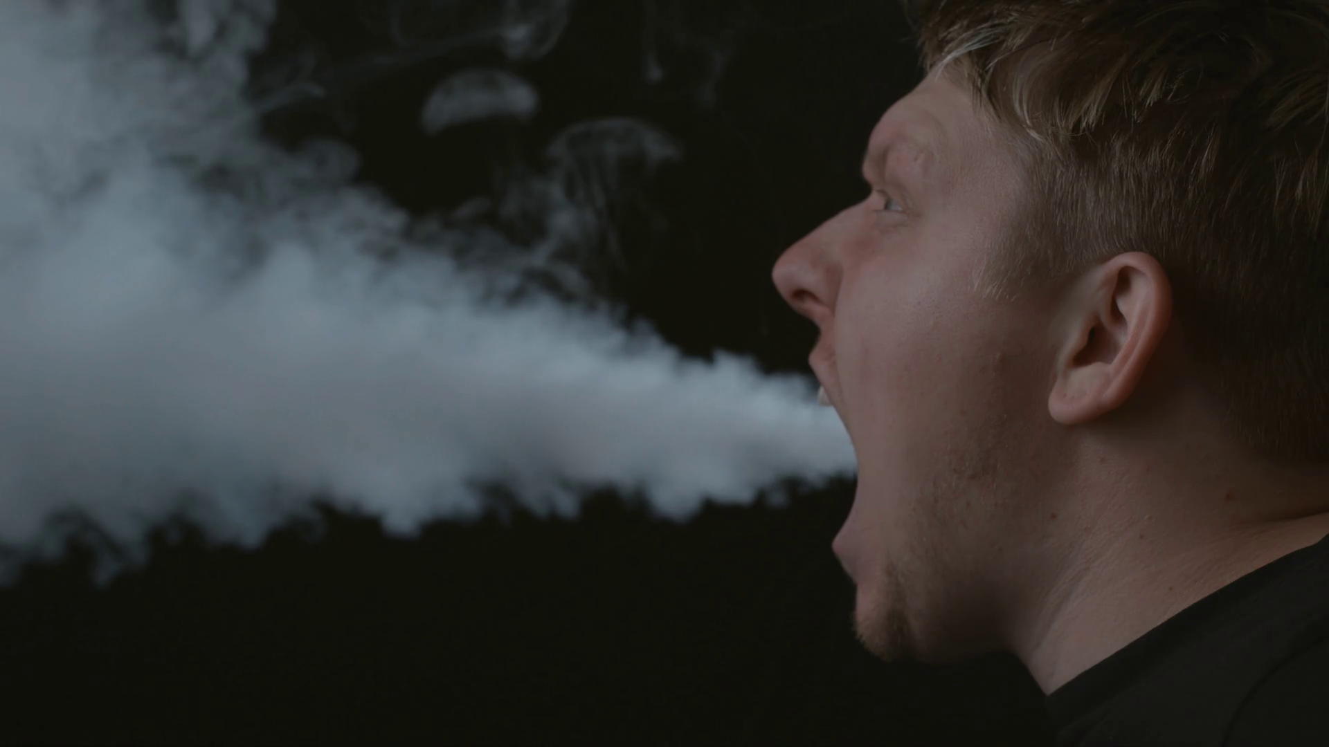 Man Breathing Smoke From Mouth In Slow Stock Footage SBV-347596981 ...