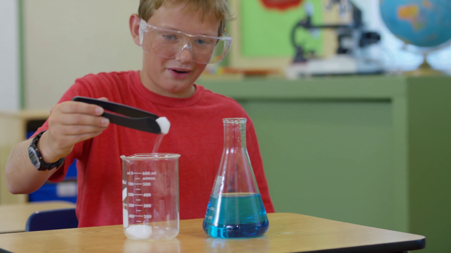 School Boy Working On Science Experiment Stock Footage SBV-347619593 ...