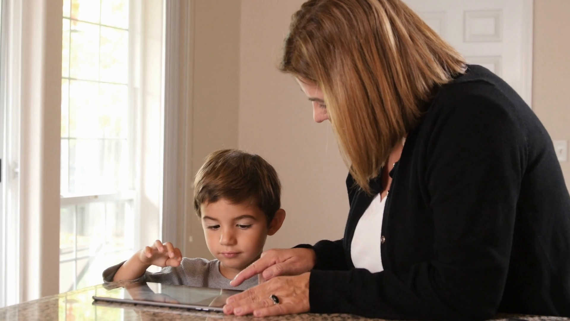 Mother Son Using Digital Tablet Together Stock Footage SBV-347627109 ...