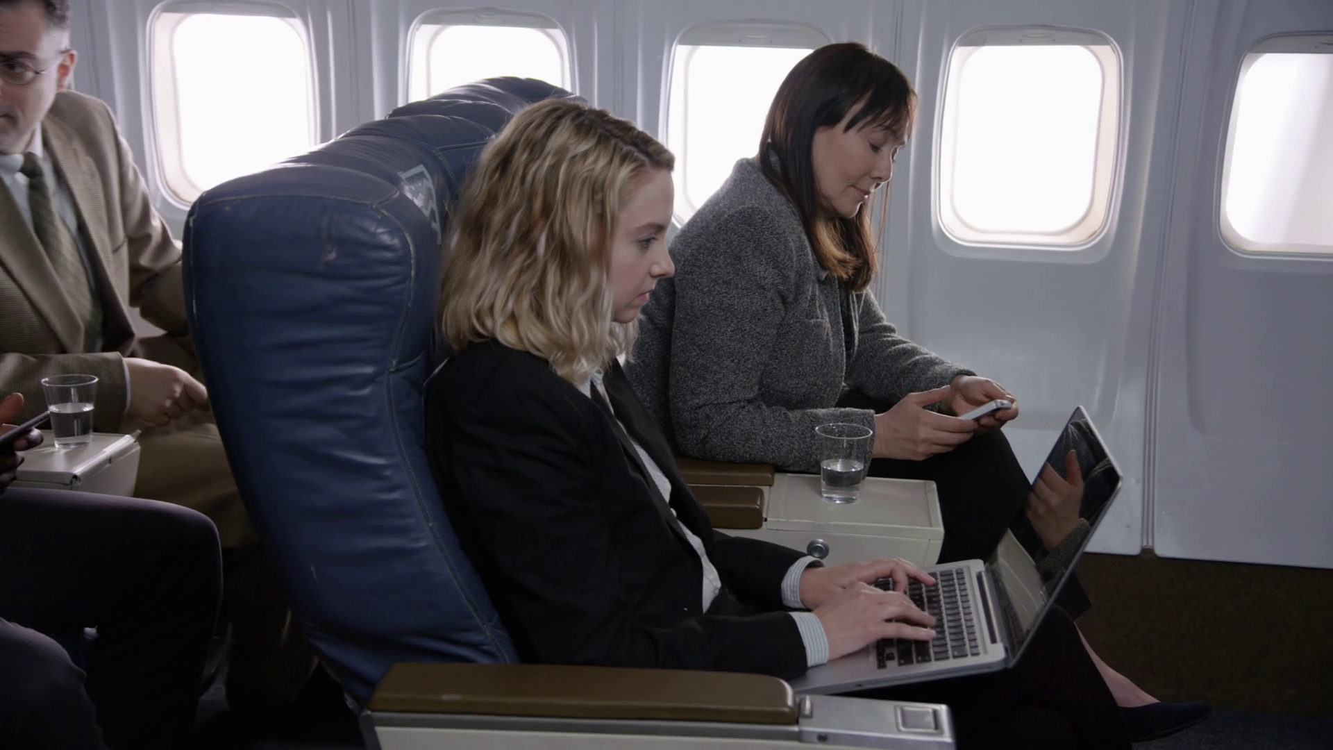 Business People Working On Airplane Flight Stock Footage SBV-347630519 ...