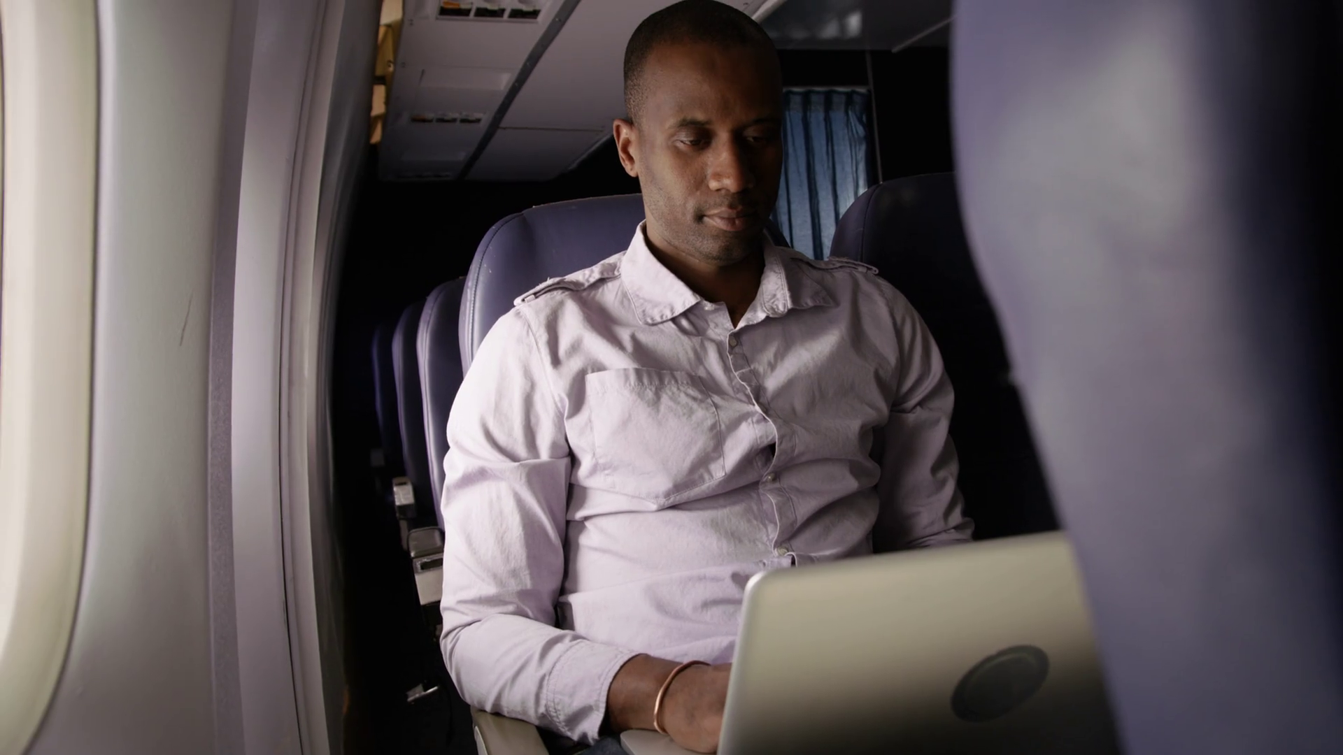 Man Working On Laptop Computer On Airplane Stock Footage SBV-347630352 ...