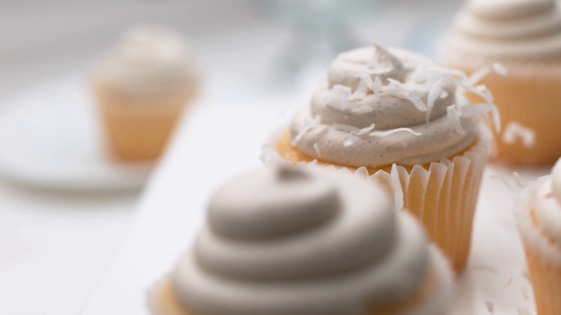 Coconut Flakes Falling Onto Cupcakes In Stock Footage SBV-347651456 ...