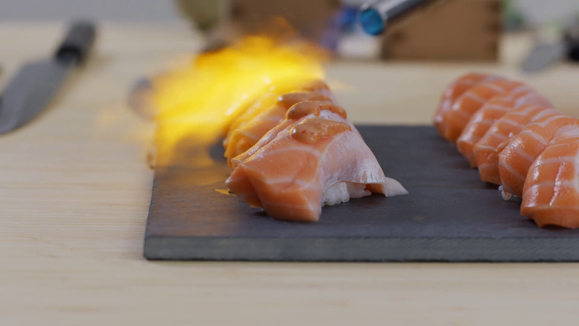 Sushi Chef Uses Torch To Flambé Salmon Sushi Stock Footage SBV ...
