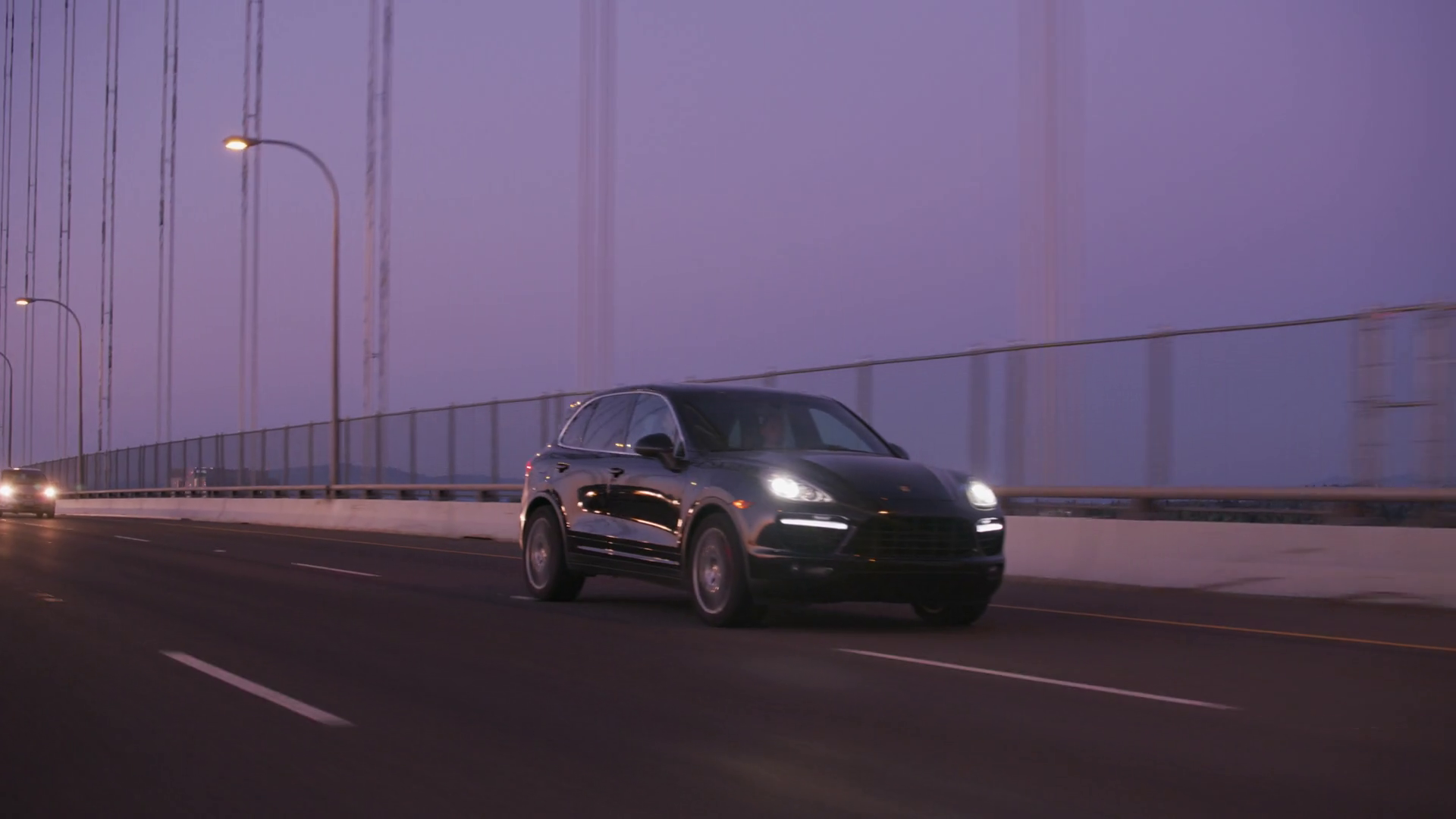 Porsche Cayenne Driving Across Bridge In Stock Footage SBV-347697434 ...