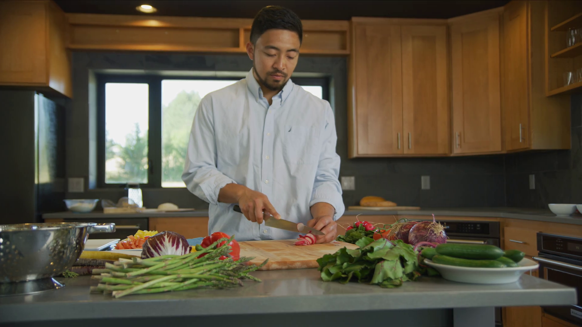 Chef In Kitchen Cutting Vegetables Stock Footage SBV-347698232 ...
