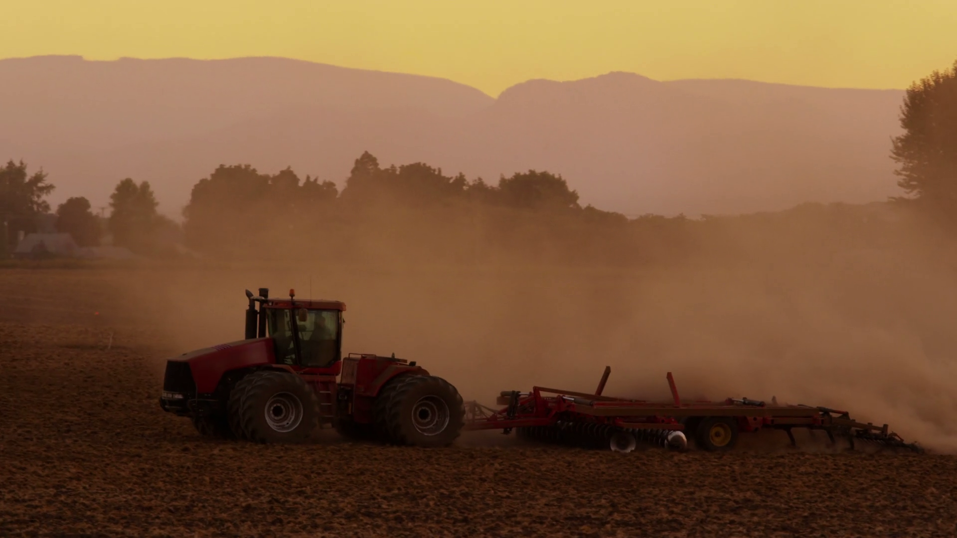 Tractor Plowing Field At Sunset Stock Footage SBV-347754692 - Storyblocks