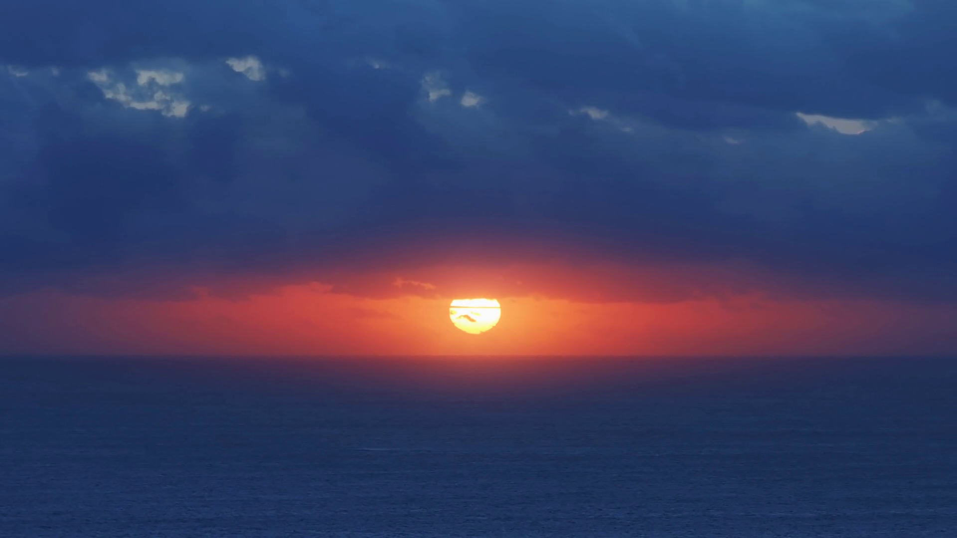 Sunset Over Ocean With Vivid Red Blue Clouds Stock Footage SBV ...
