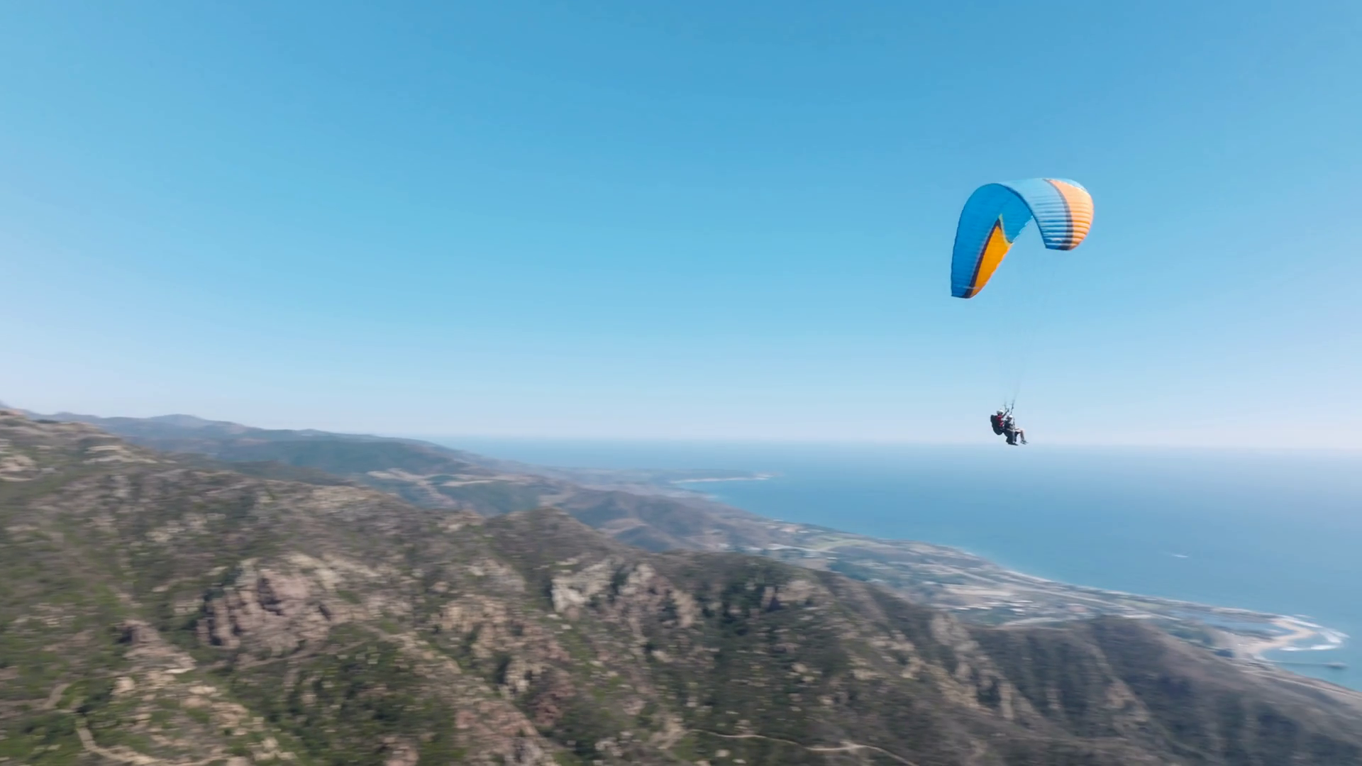 Two Paragliders Flying Over Mountain Top In Stock Footage SBV-347774693 ...