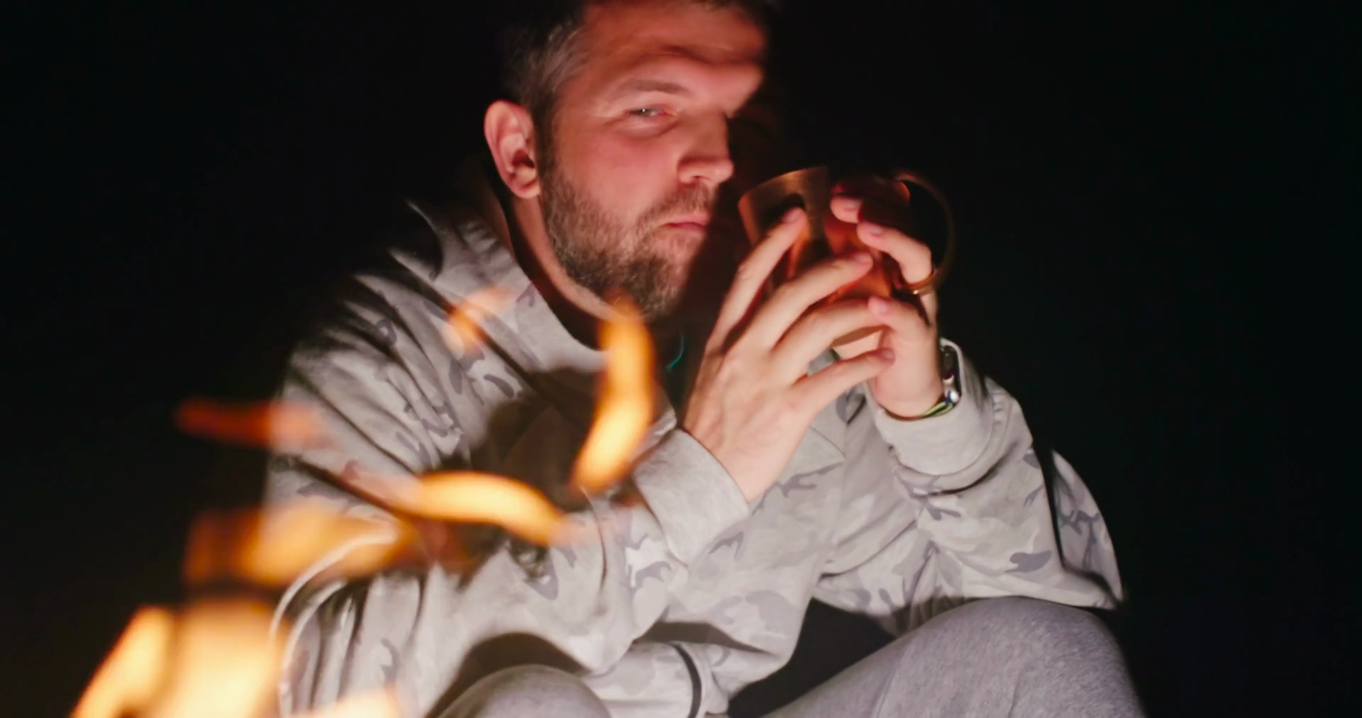 Male Hiker Enjoying Bonfire Glow At Camping Stock Footage SBV-348625987 ...