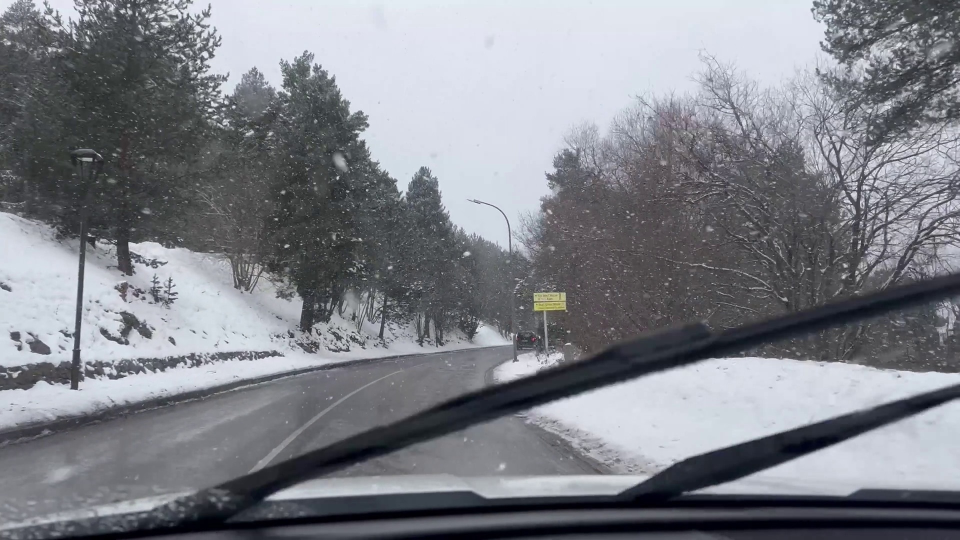 Snow Falling On Windshield Of Car Driving On Stock Footage SBV ...
