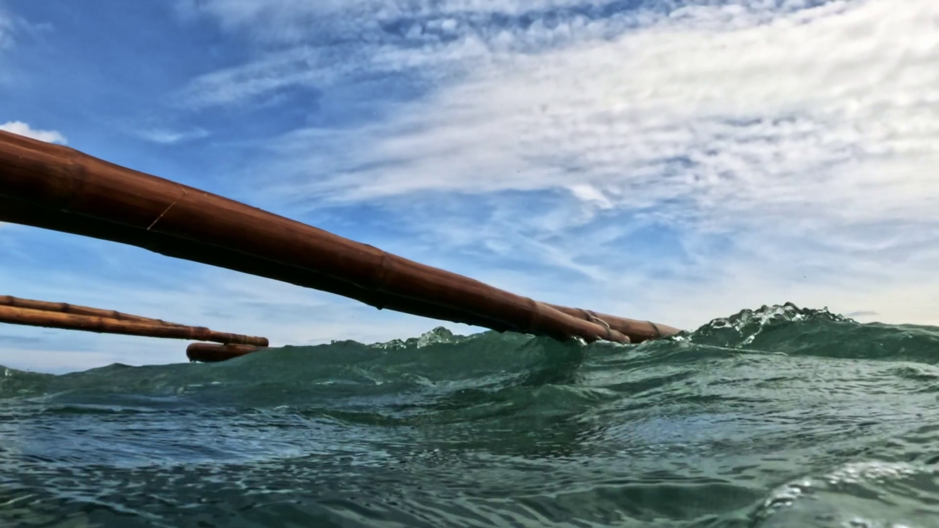 Bamboo Outrigger Boat Gliding Over Ocean In Stock Footage SBV-352357110 ...